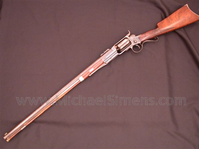 COLT REVOLVING RIFLE IN 44 CALIBER.